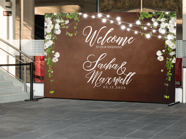 Wedding Welcome Brown background with lights and greenery Vinyl Backdr ...